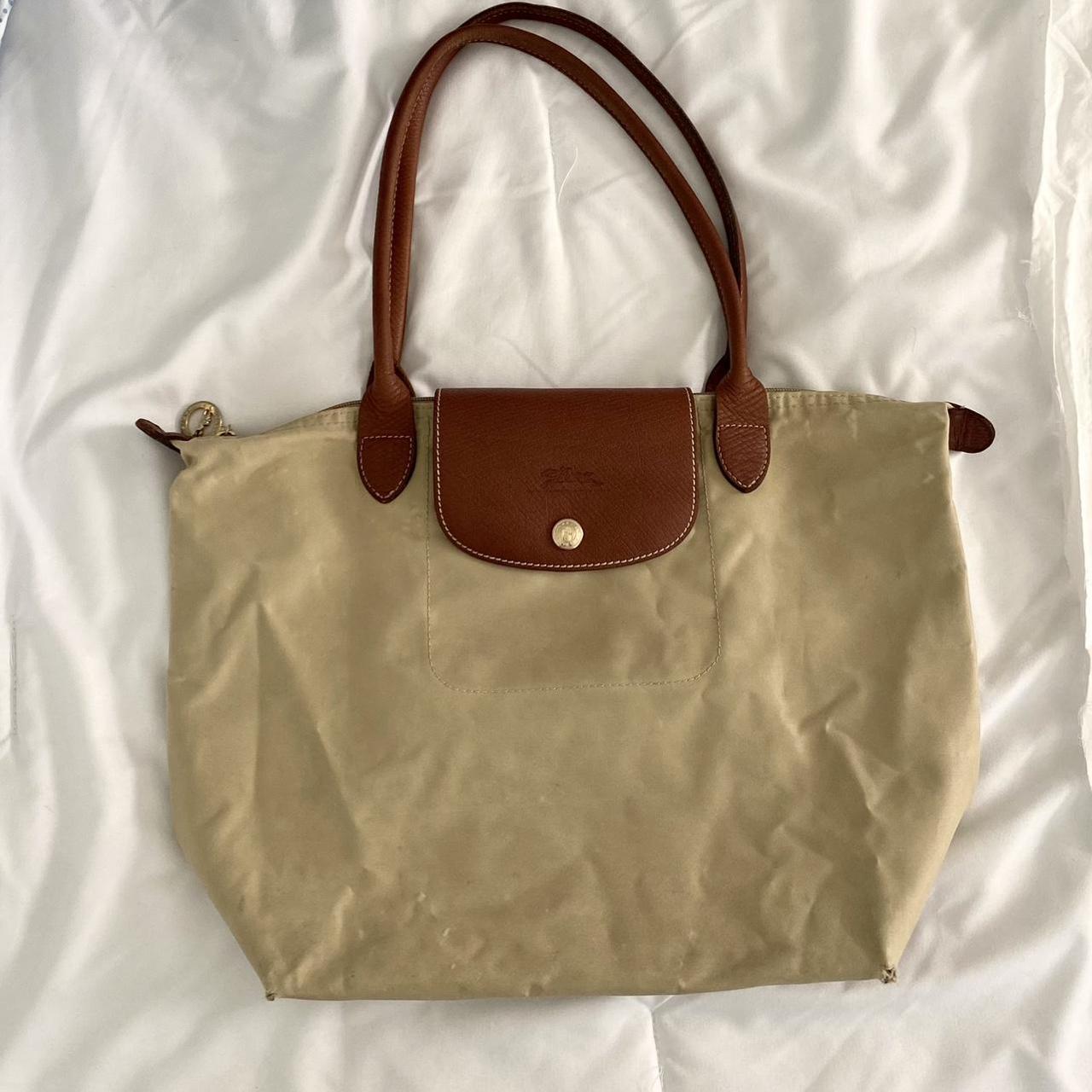 Small Longchamp Le Pliage tan bag!! Definitely some... - Depop