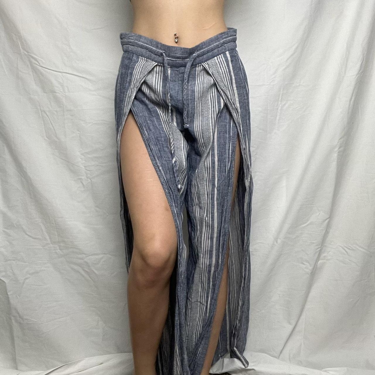 striped pants with slits down both legs brand... - Depop
