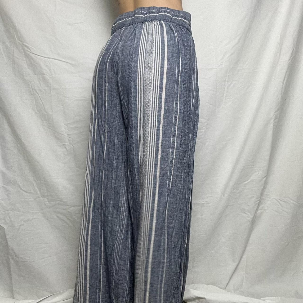 striped pants with slits down both legs brand... - Depop