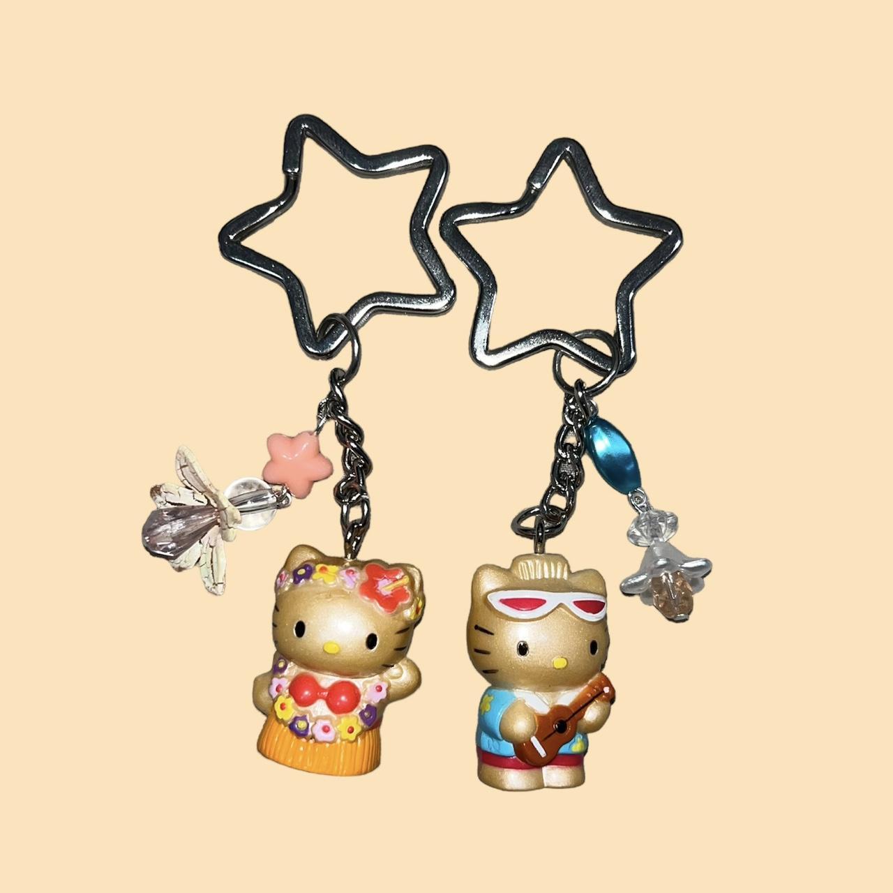 Couple Hawaii hello kitty and Daniel keychain... - Depop