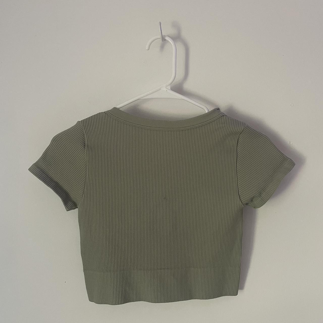Garage Women's Green Crop-top | Depop