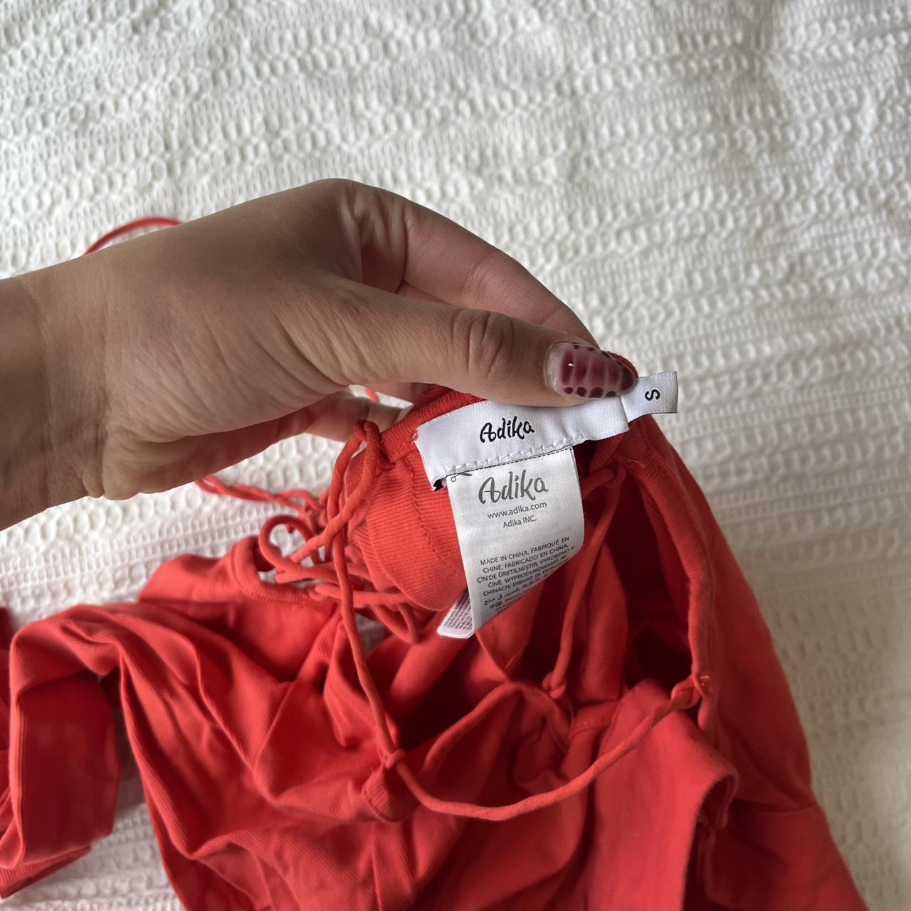 Red Adika top that has a tie up back - Depop