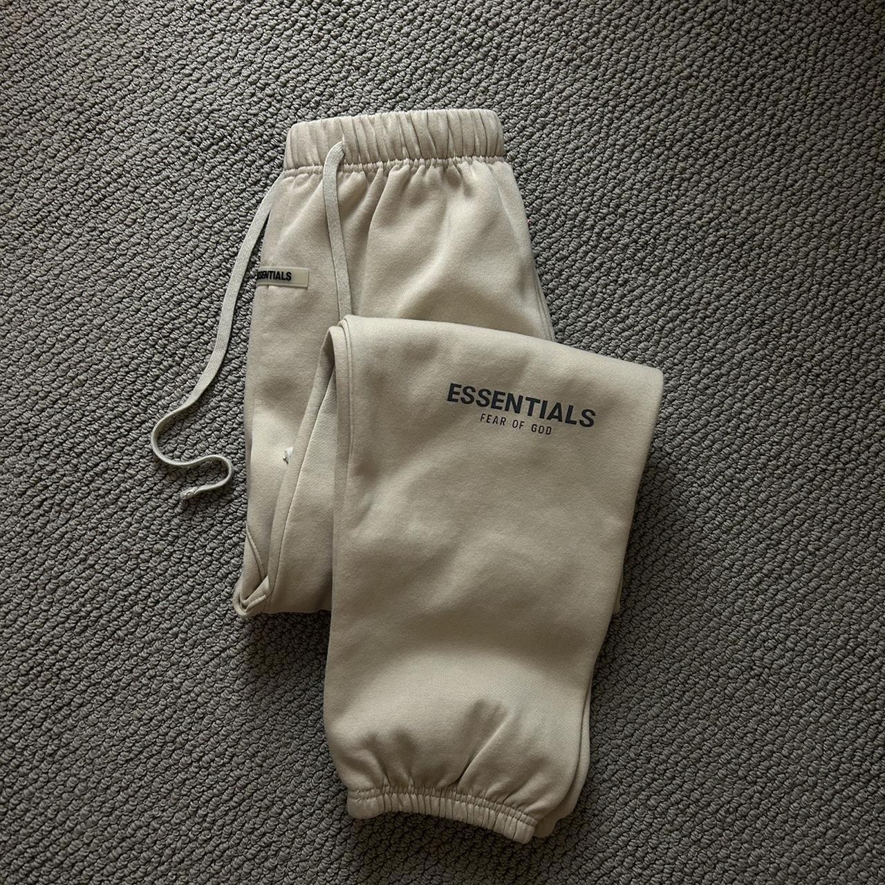 Thrifted these cream yellow essentials sweat pants,... - Depop