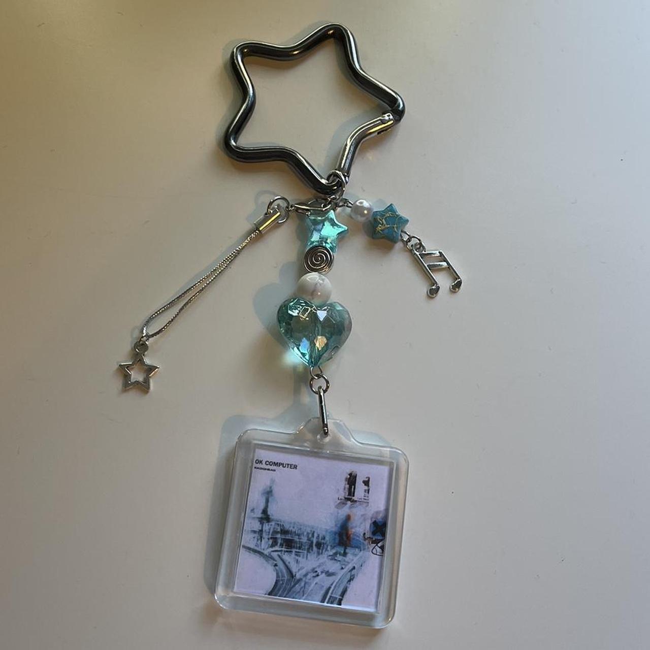 Radiohead OK Computer album carabiner keychain... - Depop