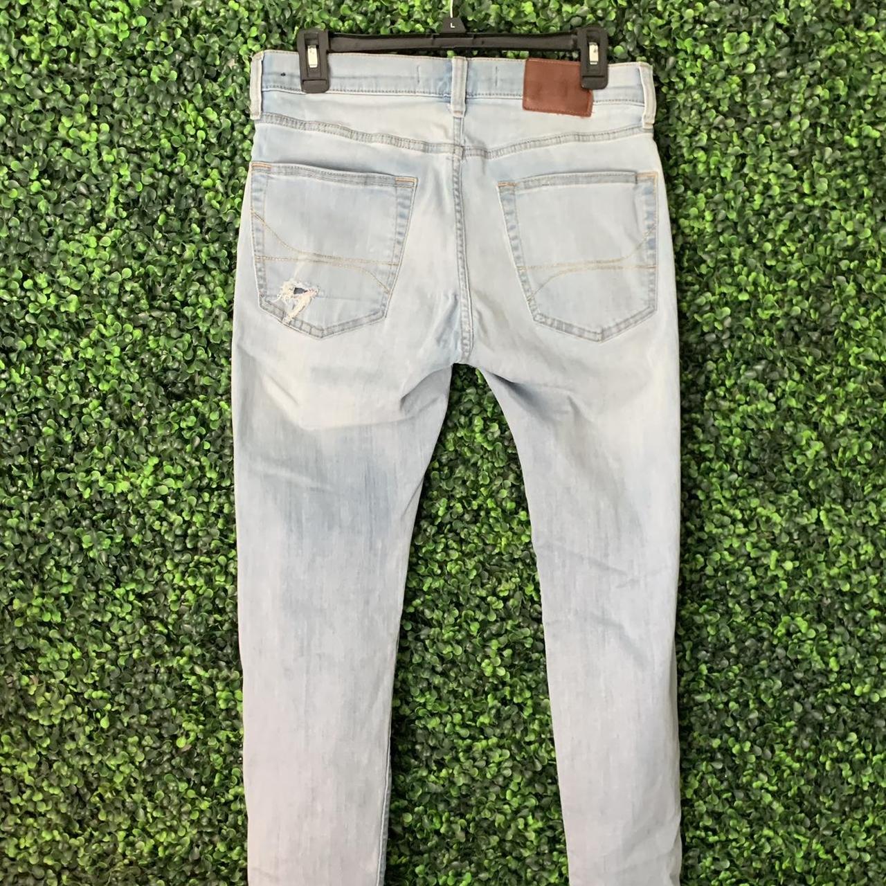 Skinny fit jeans with knee rips - Depop