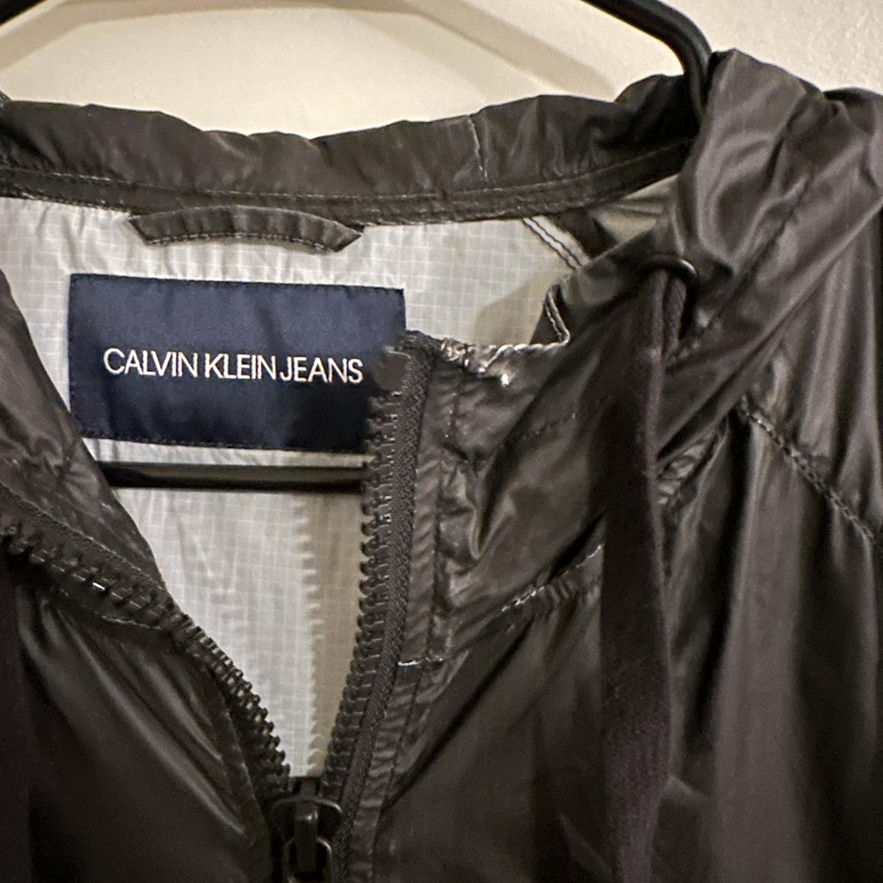 Men’s Calvin Klein rain jacket. Has a middle zipper... - Depop