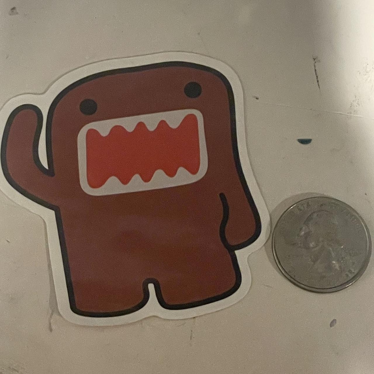 domo :[] sticker compared to quarter idk where i... - Depop