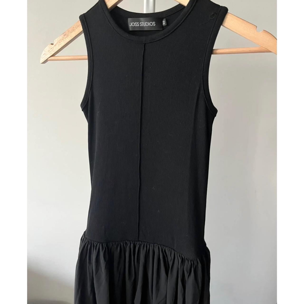 Sleek & clean cut black dress (one-piece) with... - Depop