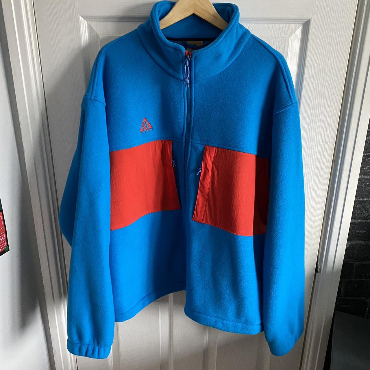 Nike ACG blue and orange zip up fleece. Band new... - Depop