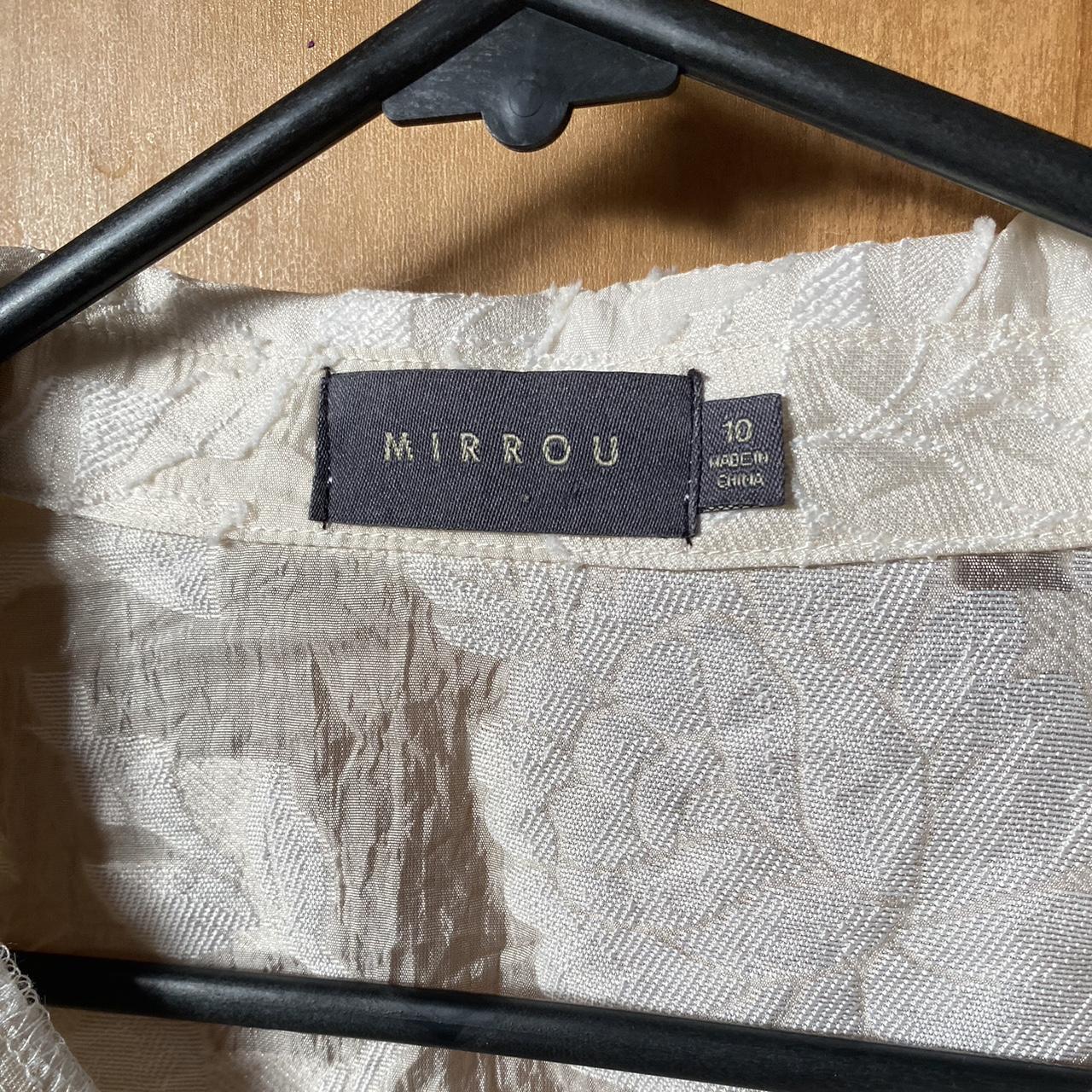 A gorgeous floral print button up top from mirrou In... - Depop