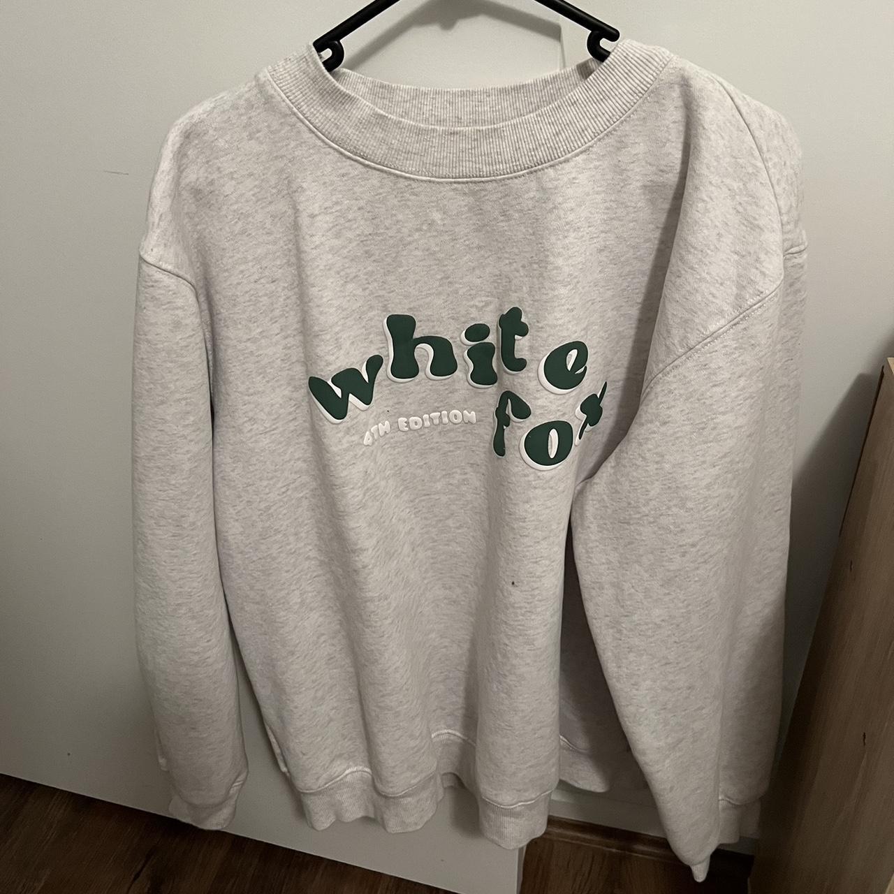 White fox jumper has a small mark in the front... - Depop