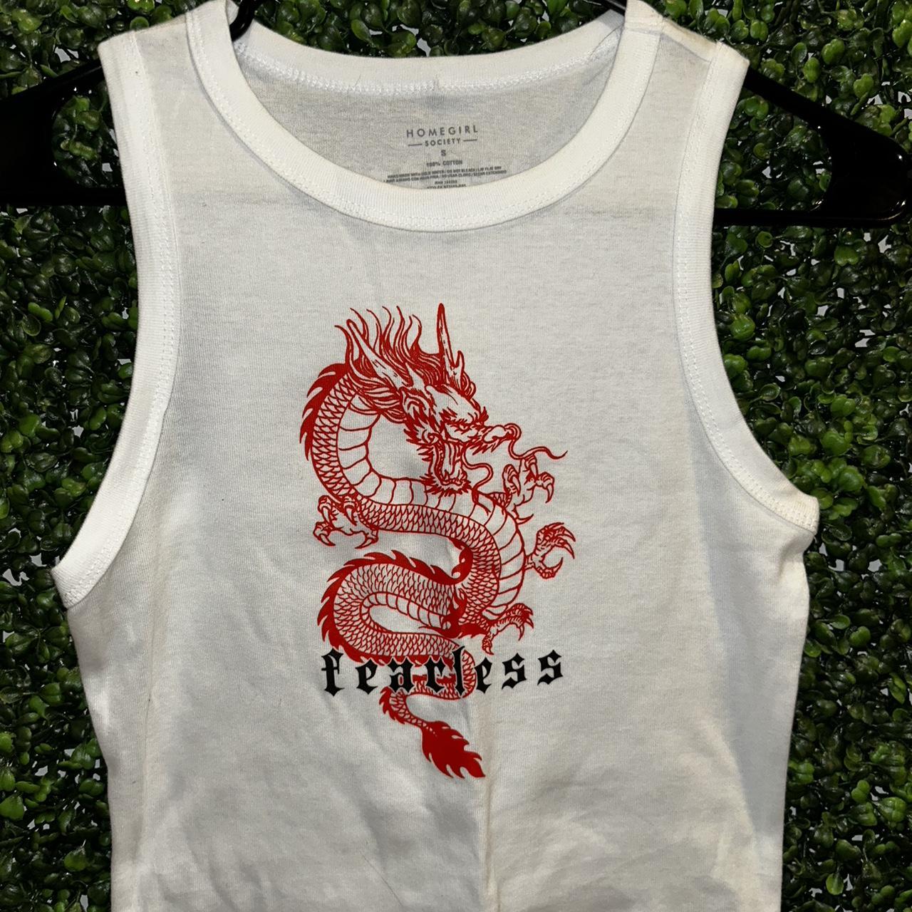 White racerback style cropped tank. Cute Dragon... - Depop