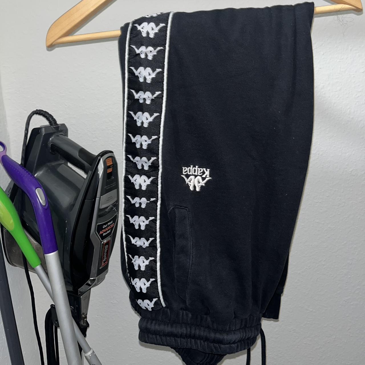 Black Kappa sweat pants with a hole in the pocket - Depop