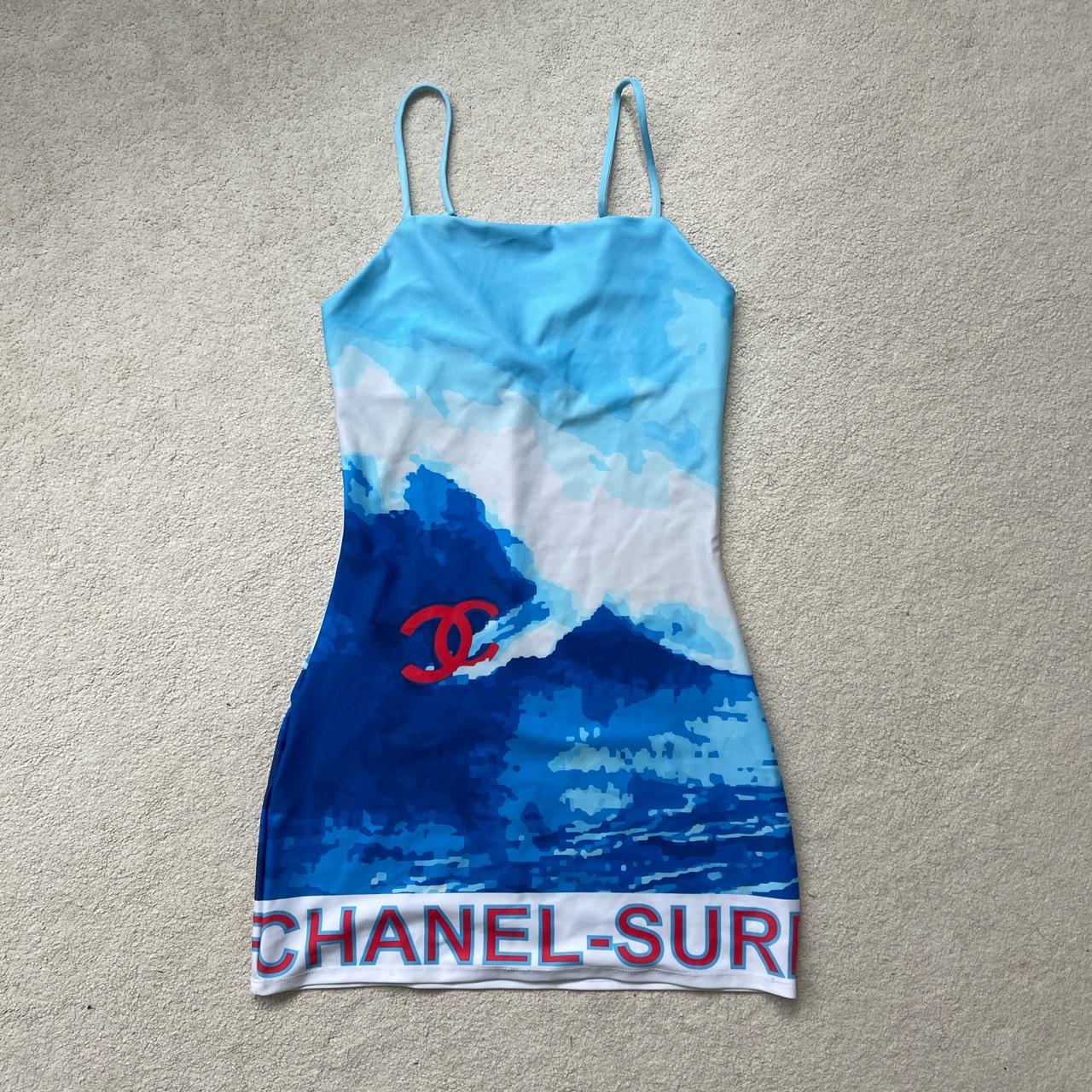 Blue wave surf dress from slim, size small - Depop