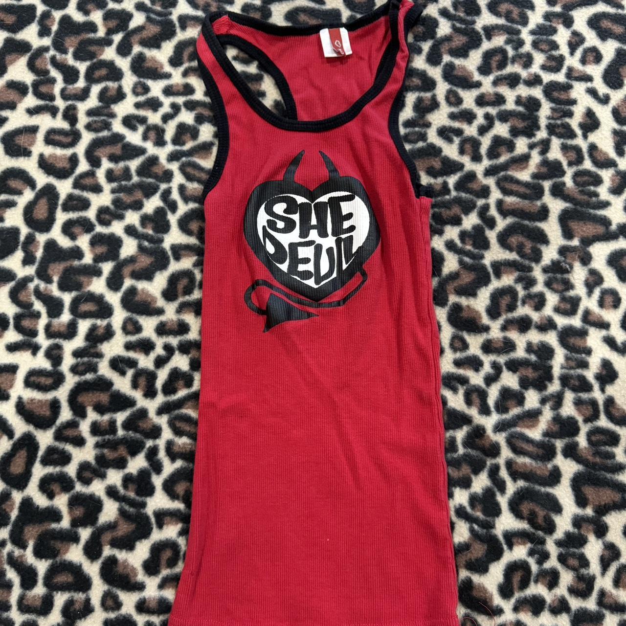 Red and black She Devil tank top tagged a M but can... - Depop