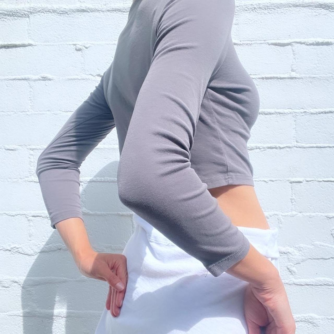 Grey long sleeve crop top with little chain details... - Depop