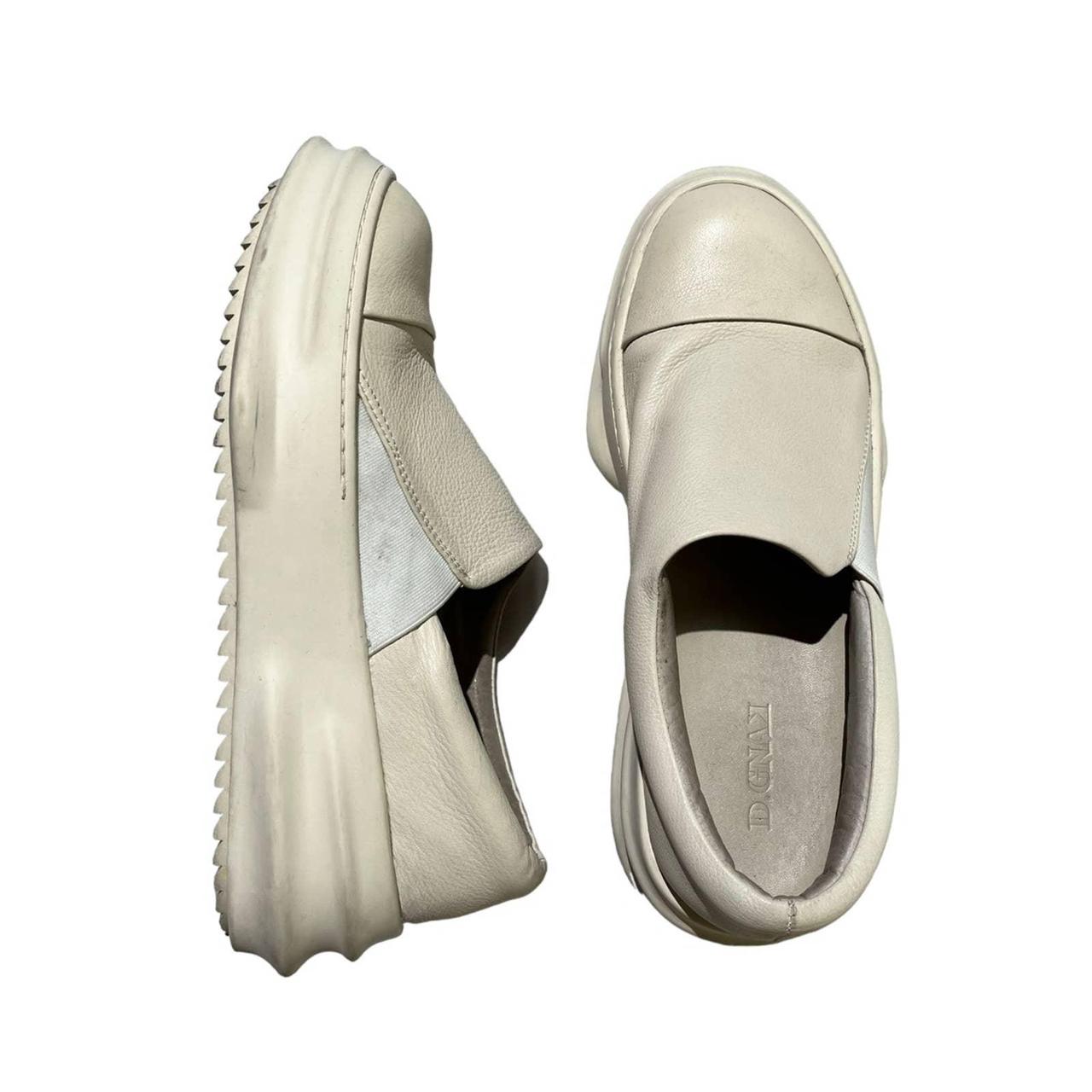 A beautiful beige/cream sneaker with an extremely... - Depop