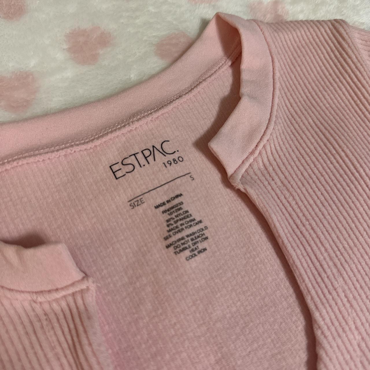baby pink ribbed seamless low cut top from... - Depop