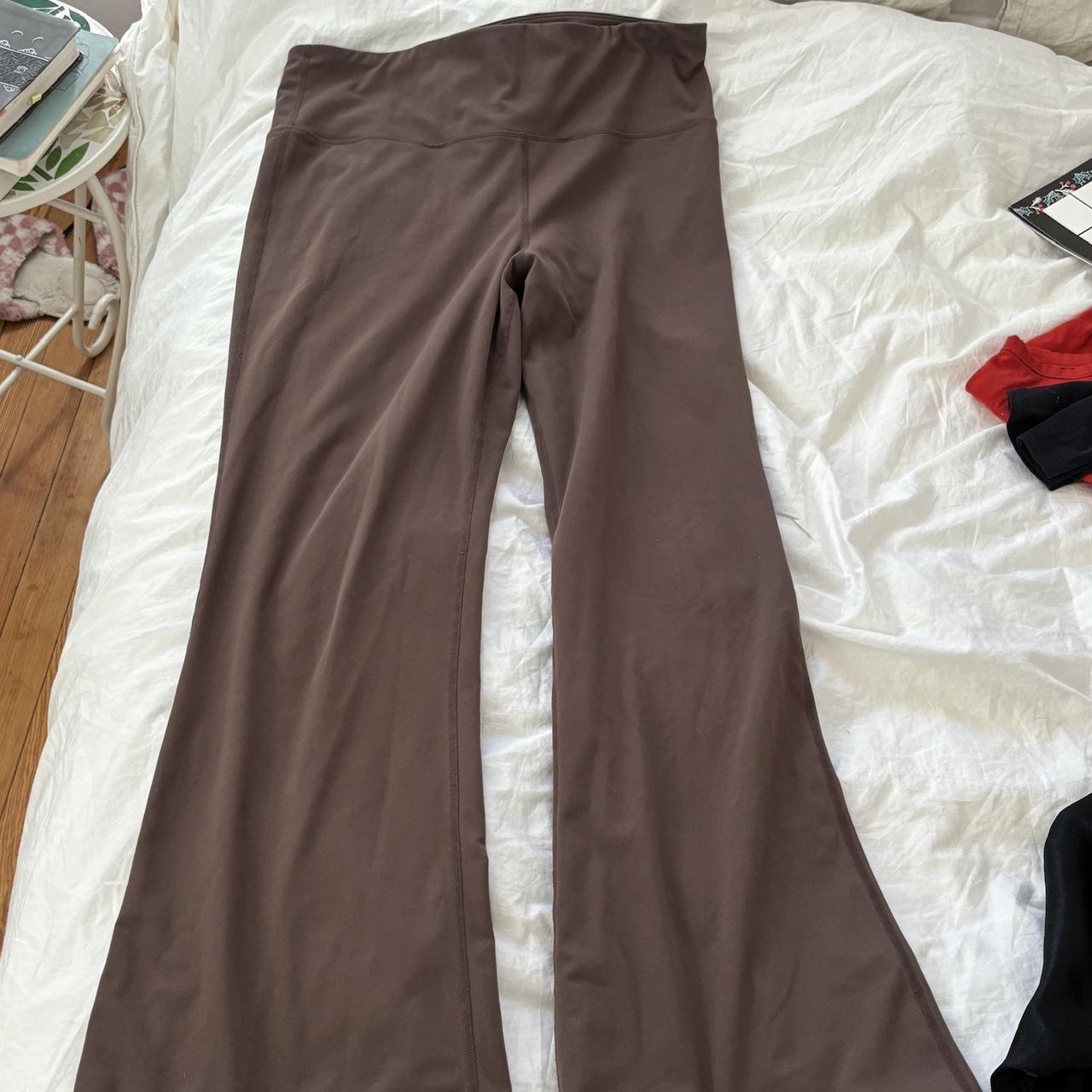 Nude/Brown yoga pants with a flared leg #yogapants... - Depop