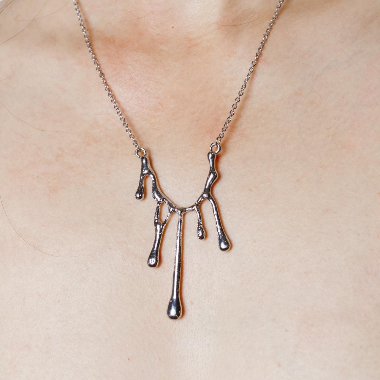 Drip Pendant Necklace The necklace features a... - Depop