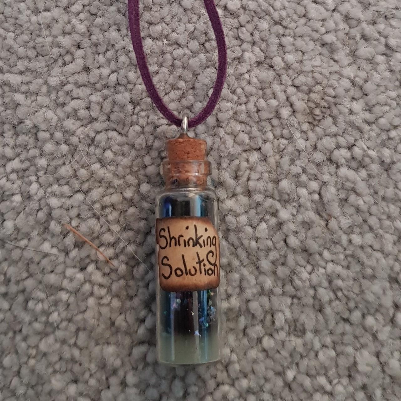 Novelty necklace for shrinking solution and solution... - Depop