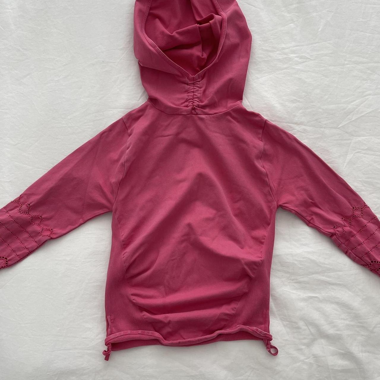 Free People pink hooded sweater. Cinches at the... - Depop