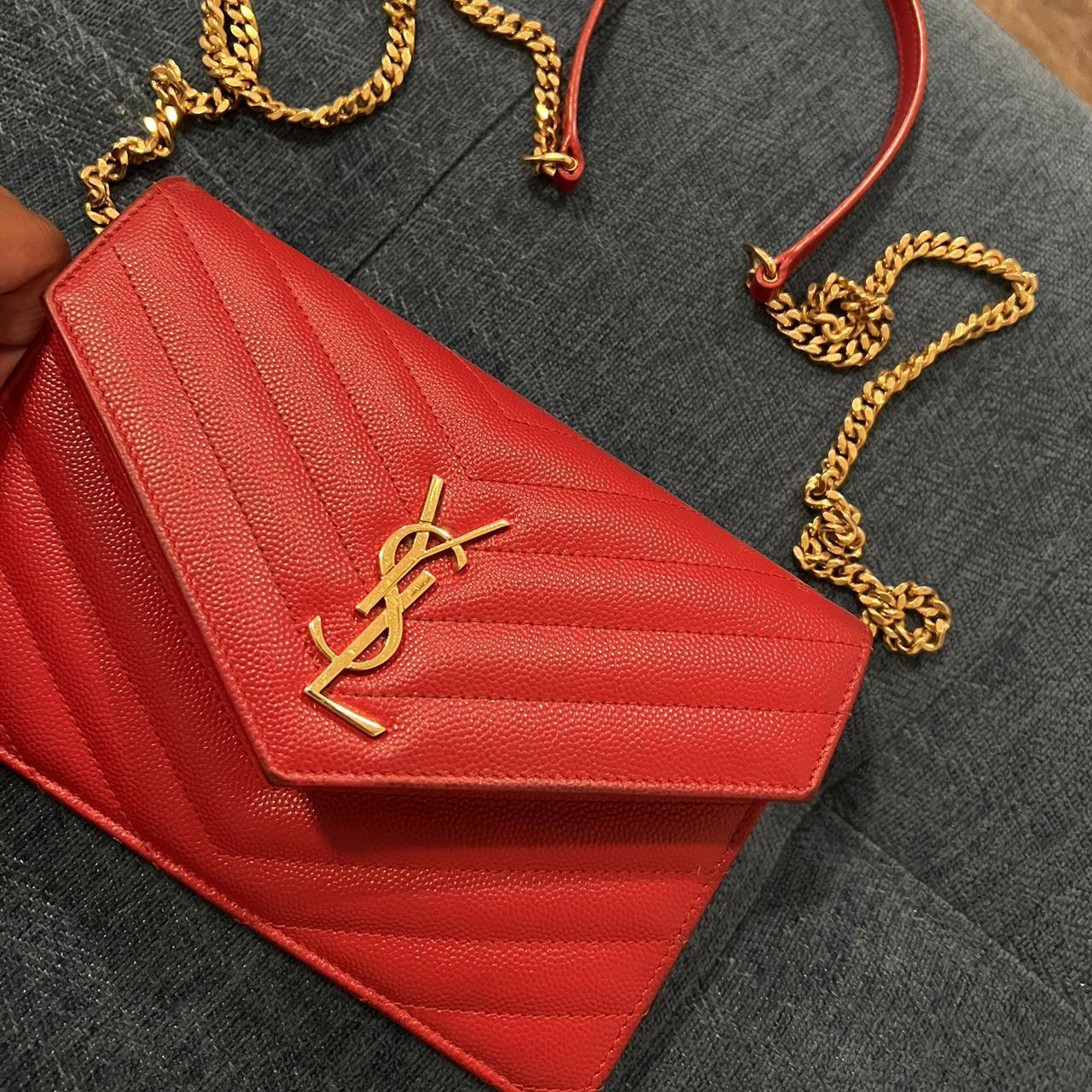 Red YSL cross body bag! Good condition My price-800 - Depop