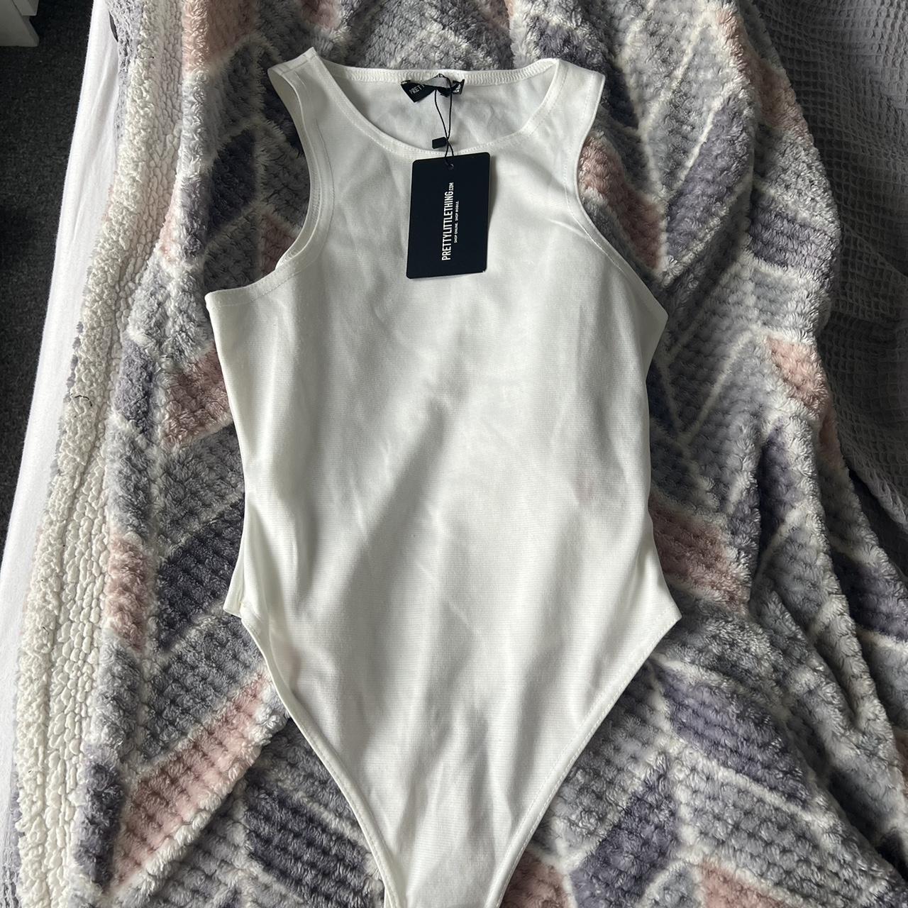 White bodysuit tags still on Never worn Size 6 - Depop