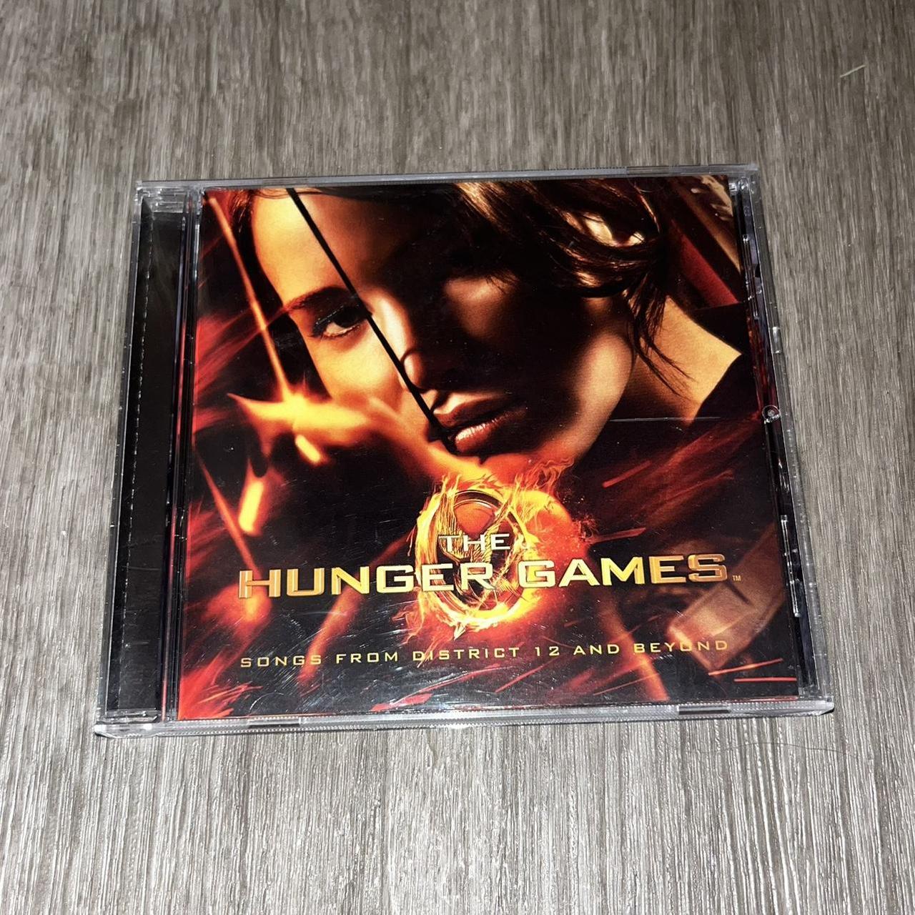 the hunger games og CD features artists like taylor... - Depop