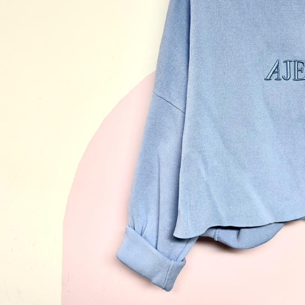 Stunning AJE blue cropped turtleneck with bold... - Depop