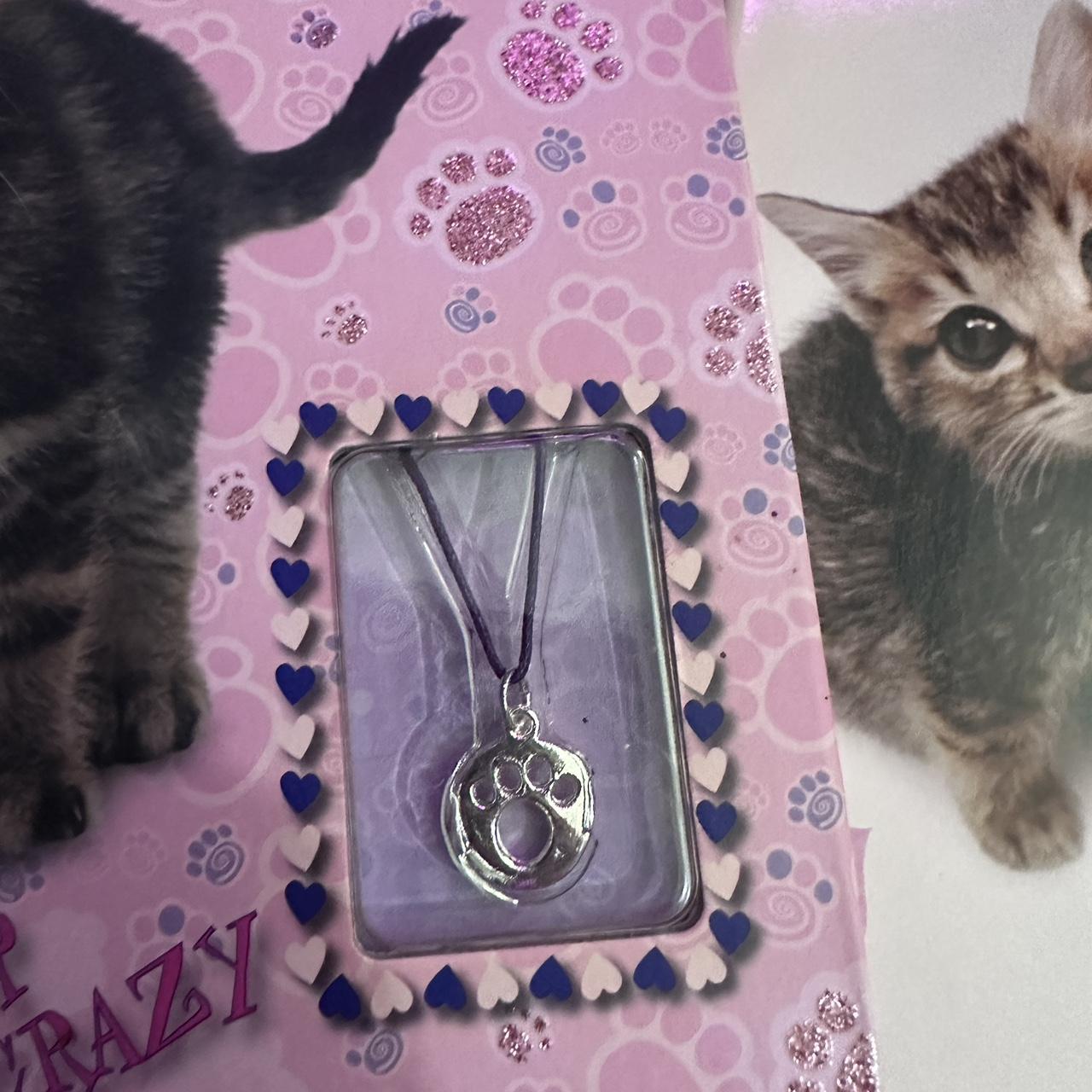 Books about cats. Pink books is about what to do to... - Depop