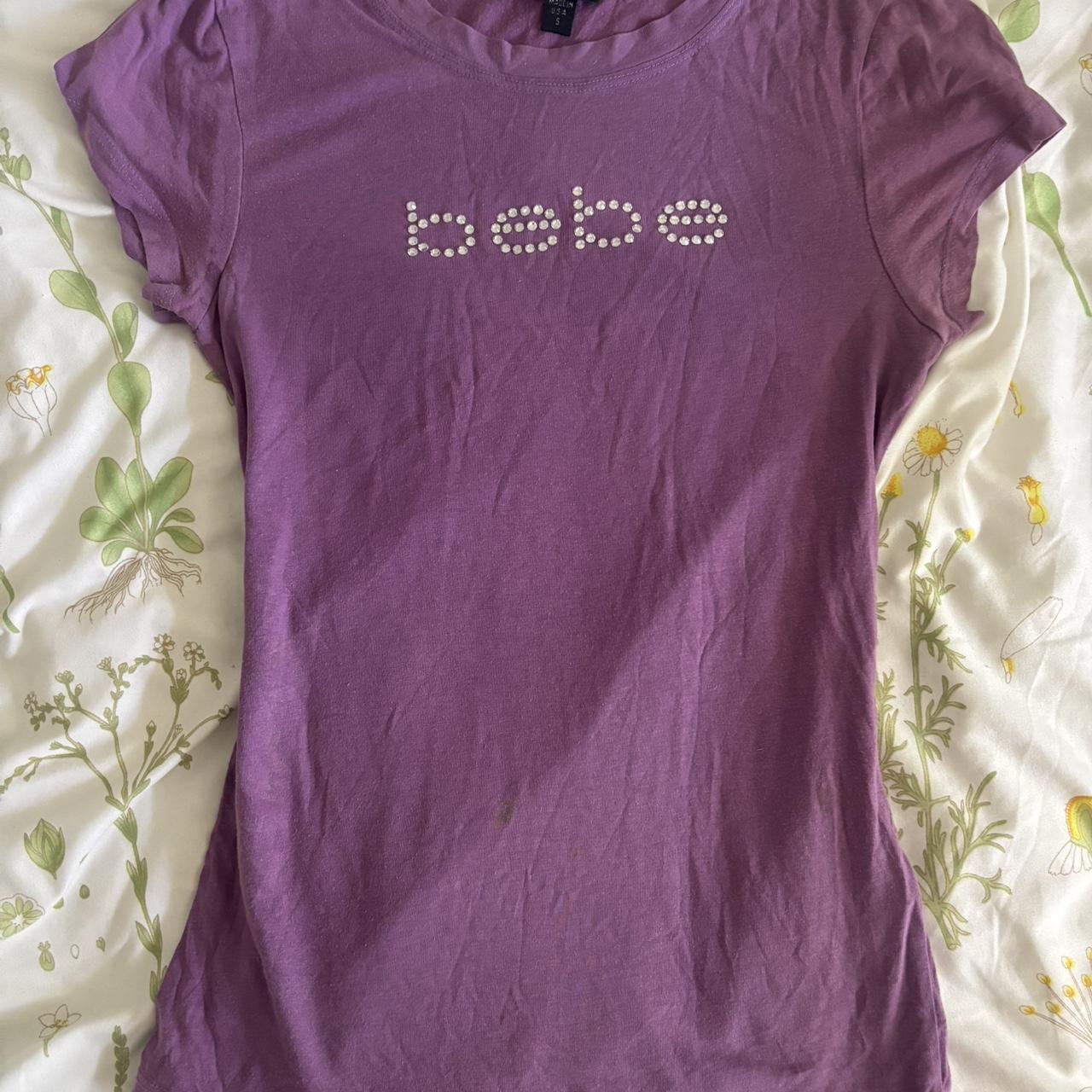 Super cute bebe rhinestone top with small stains at... | Depop