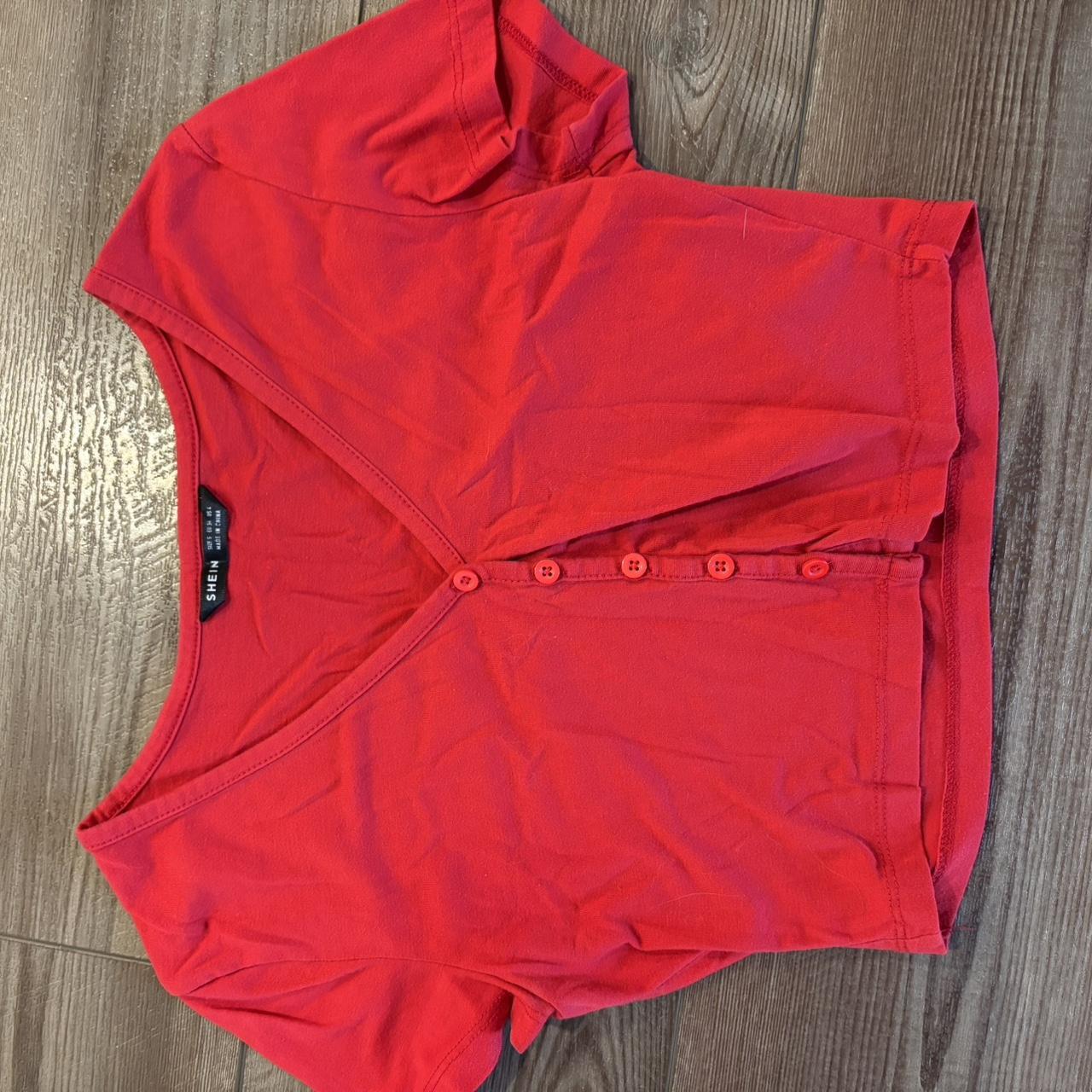 Red cropped t shirt with buttons. Great condition... - Depop