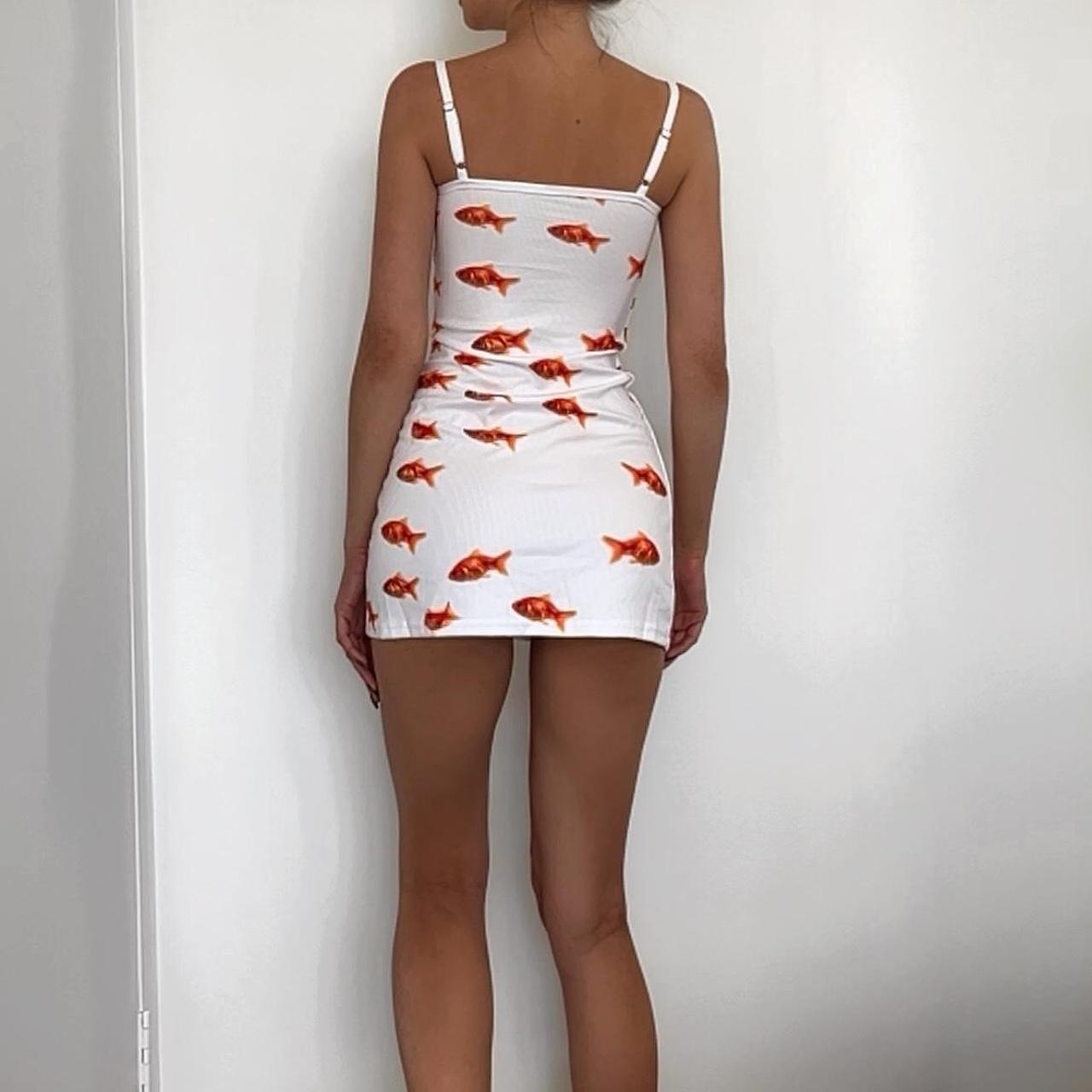 Fish Slip Mini Dress Seen on size XS Unsure of where... - Depop