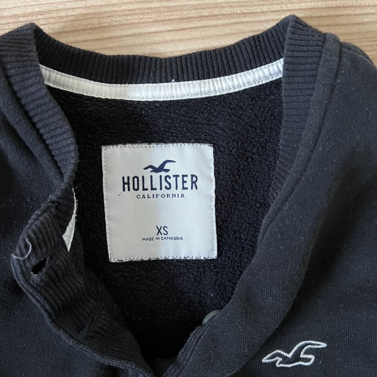 Black Hollister jumper with buttons Oversized... - Depop