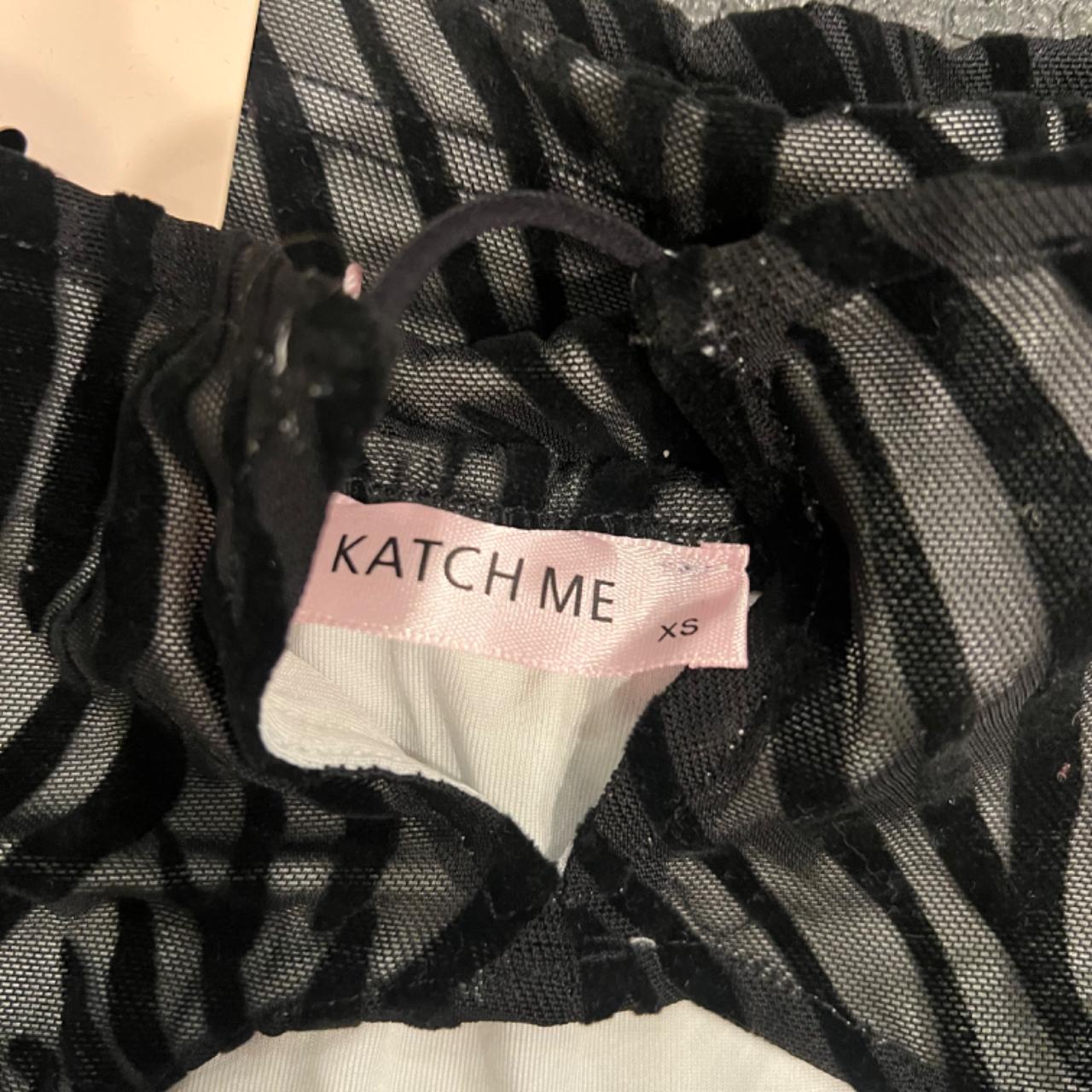 katch me dress with cutouts never worn - Depop