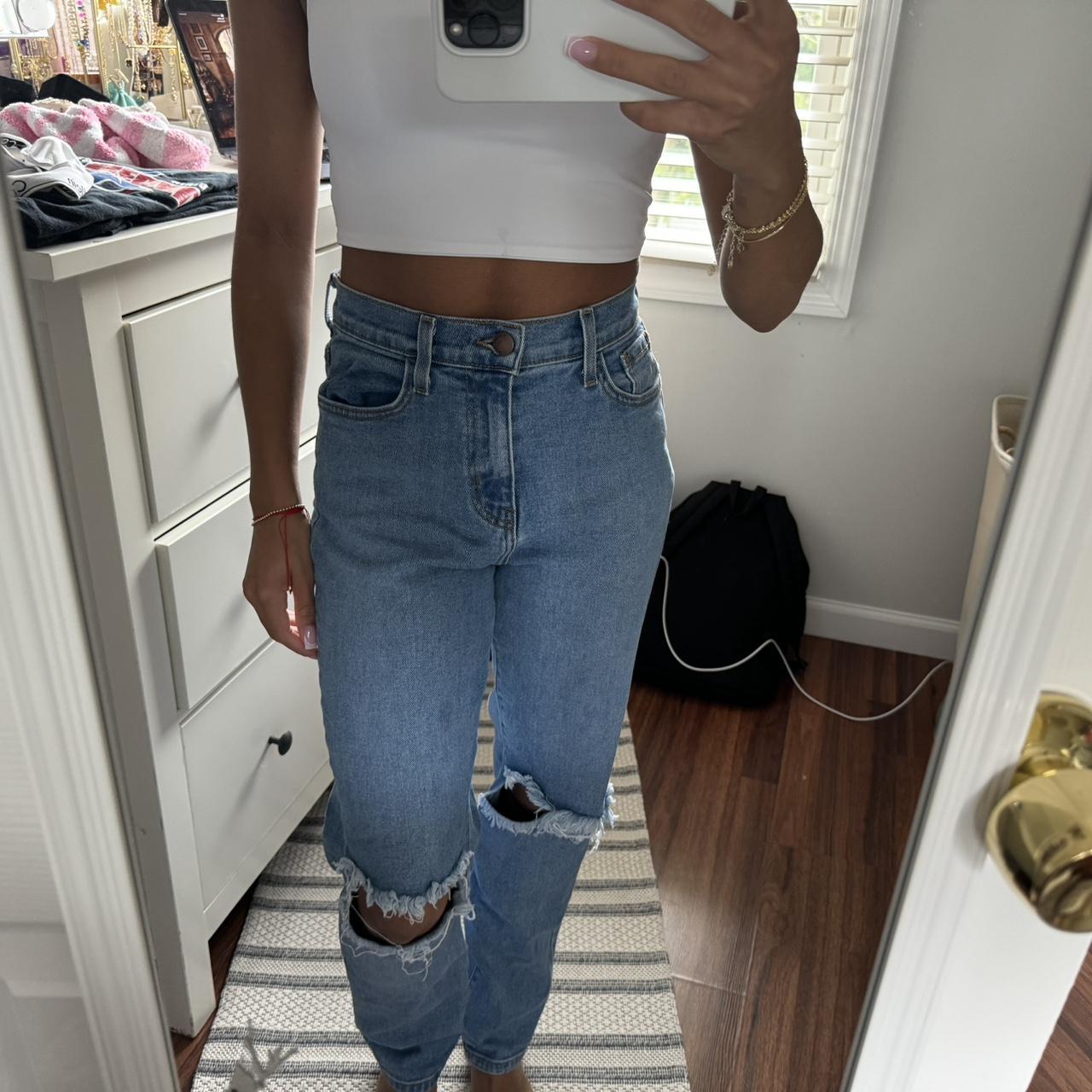 Blue knee ripped jeans (From a boutique not from... - Depop
