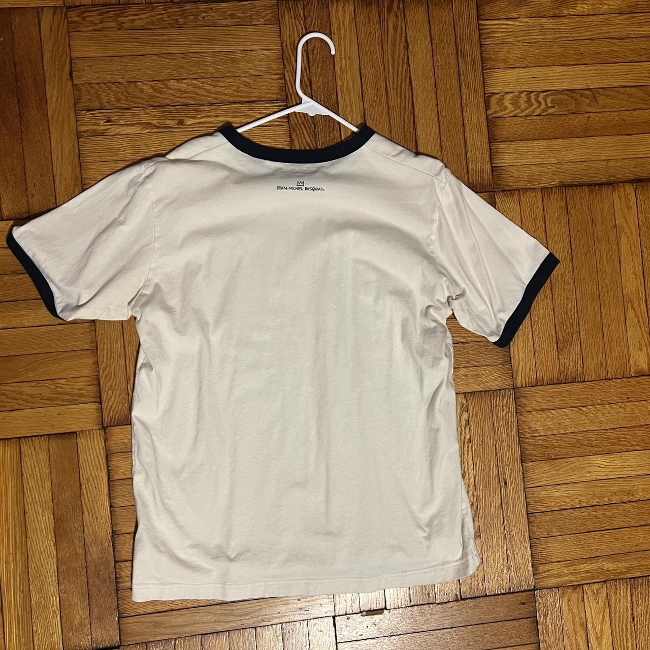 uniqlo jean-michel basquiat ringer tee. sleeves and... - Depop