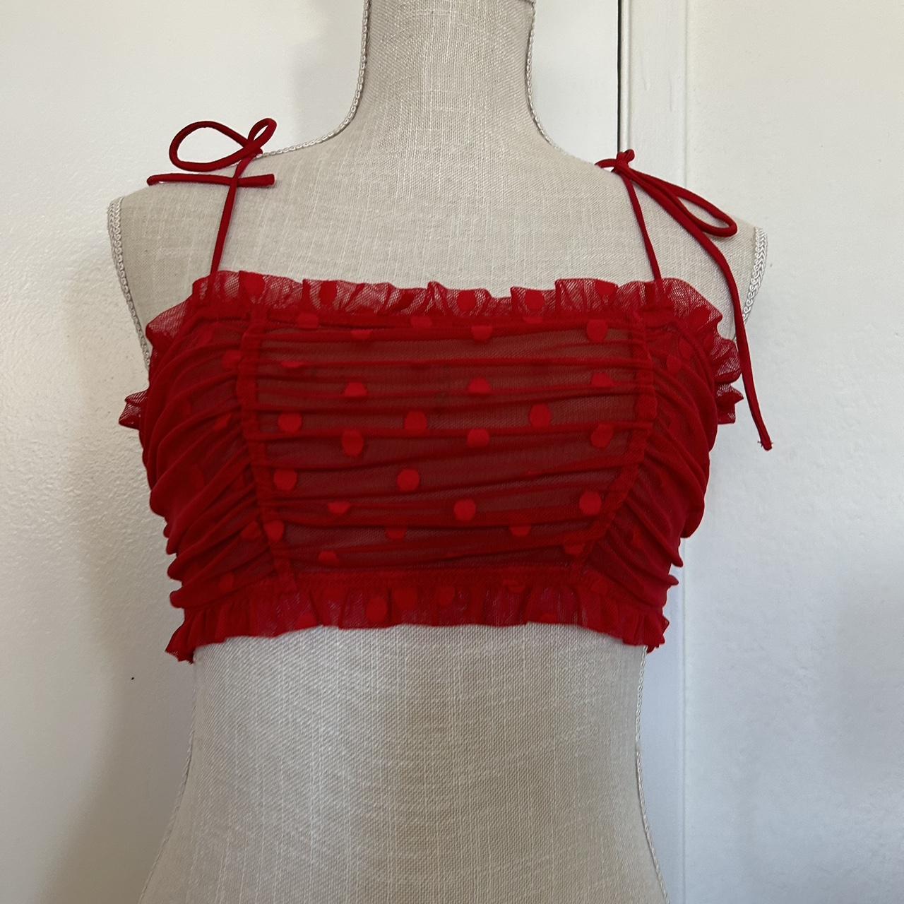 The cutes red polka dot top. Small stain behind... - Depop