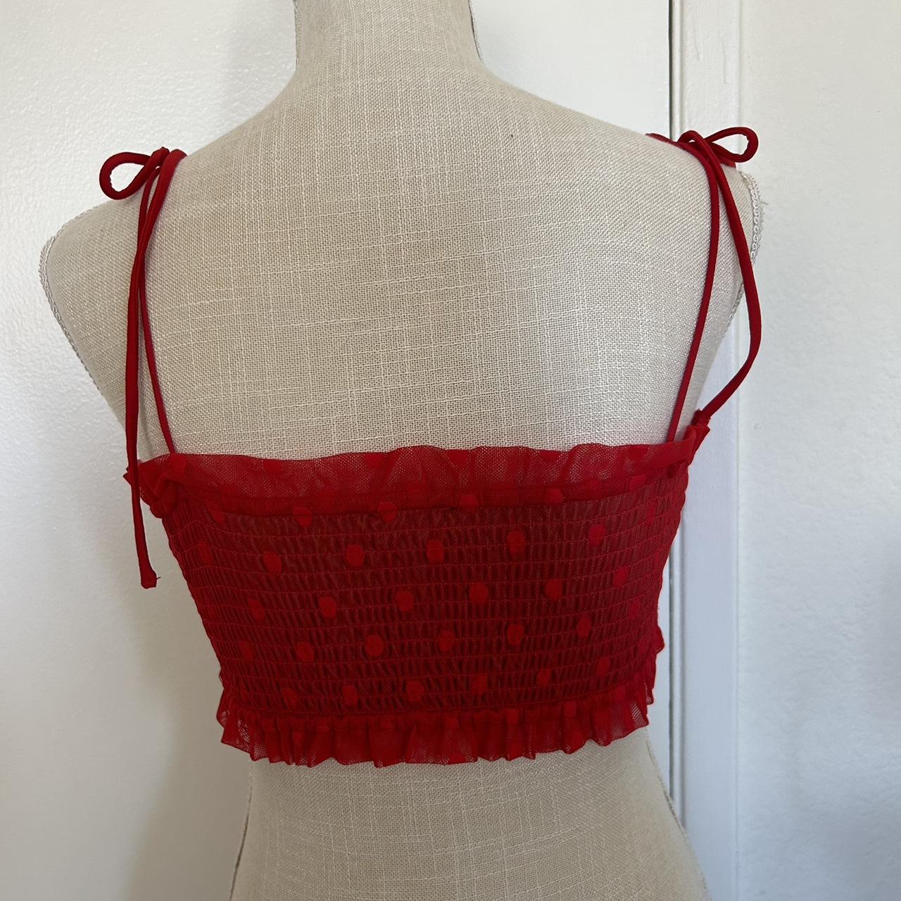 The cutes red polka dot top. Small stain behind... - Depop