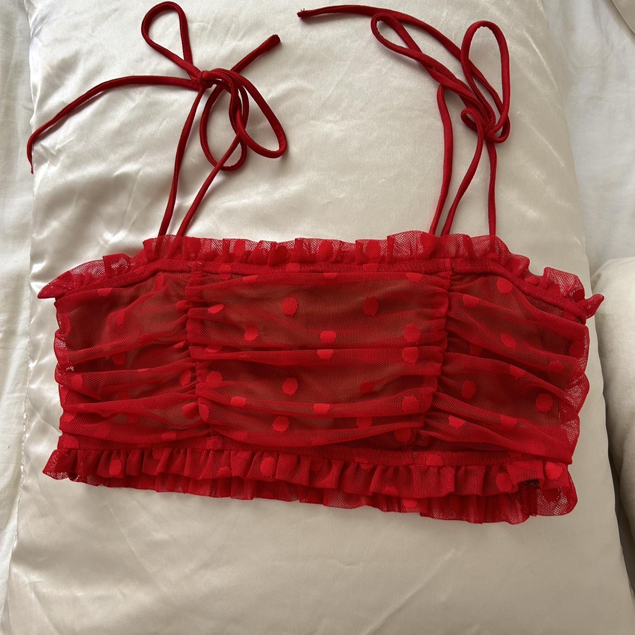 The cutes red polka dot top. Small stain behind... - Depop