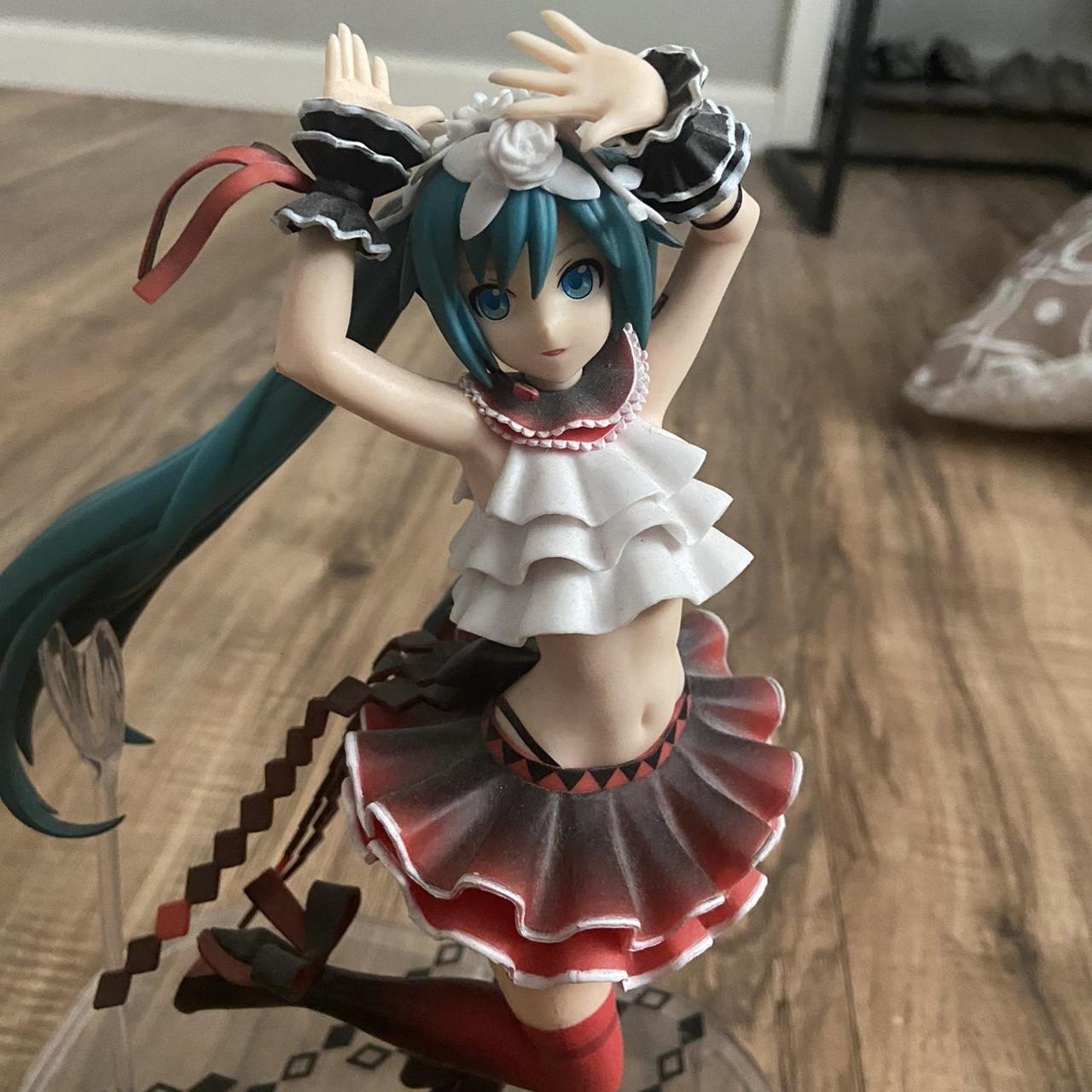 Hatsune miku figure. Comes with original box. No... - Depop