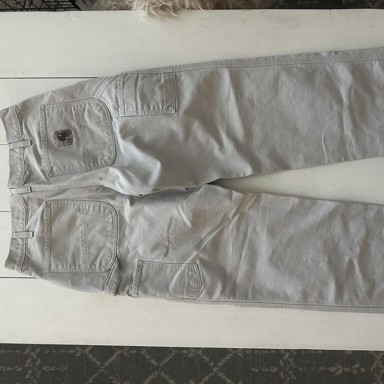 cream colored carhartt carpenter pants small stains... - Depop