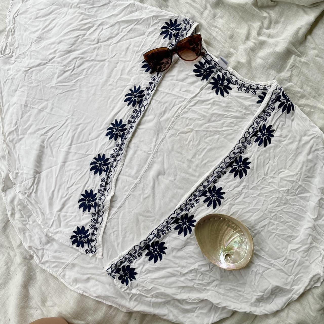 Cutest beach throw over! White with blue floral... - Depop