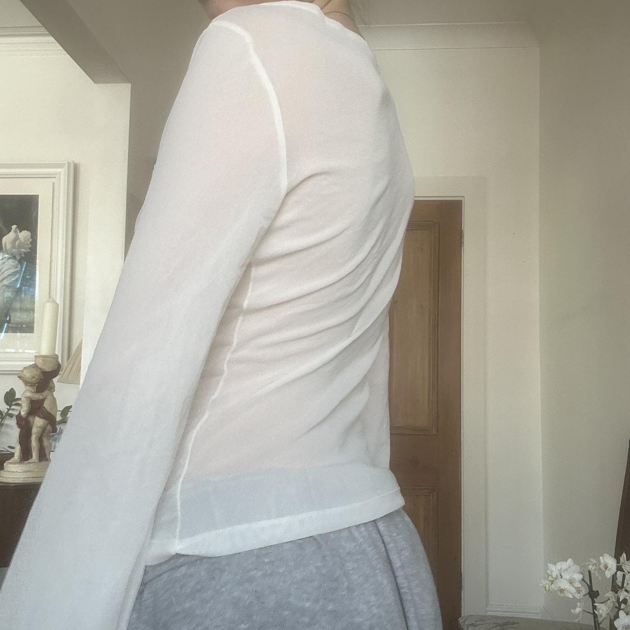 White mesh long sleeve top with a flared split... - Depop