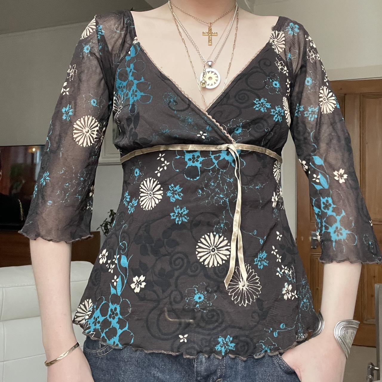 Sheer black & blue floral wrap style top with ribbon... | Depop