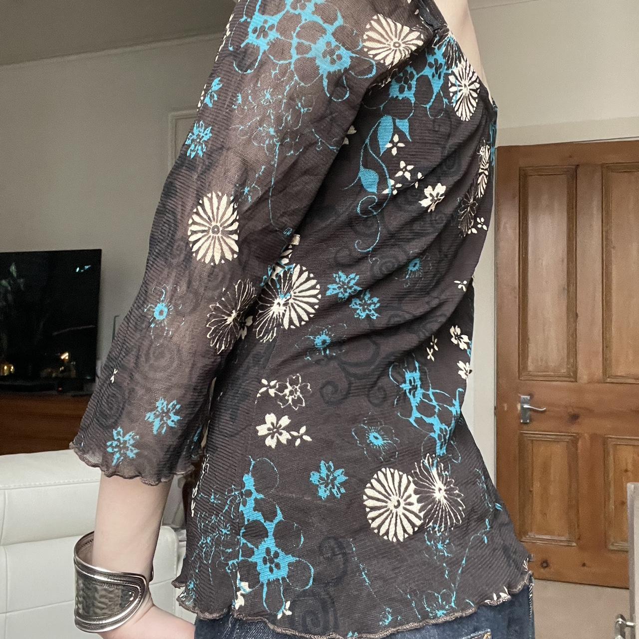 Sheer black & blue floral wrap style top with ribbon... | Depop