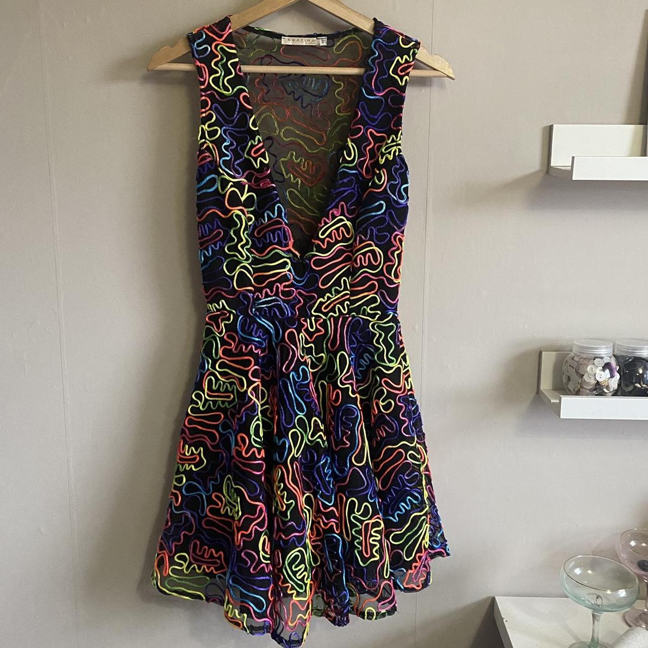 Fun party dress, deep V neckline with netting... - Depop