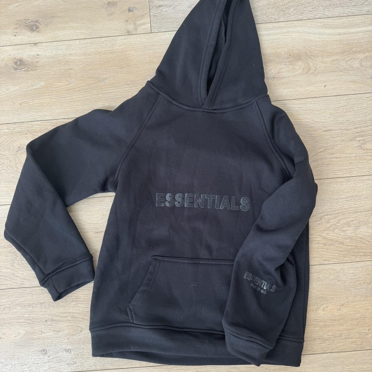 FAKE (off brand) Essentials Black Hoodie Size Large... - Depop