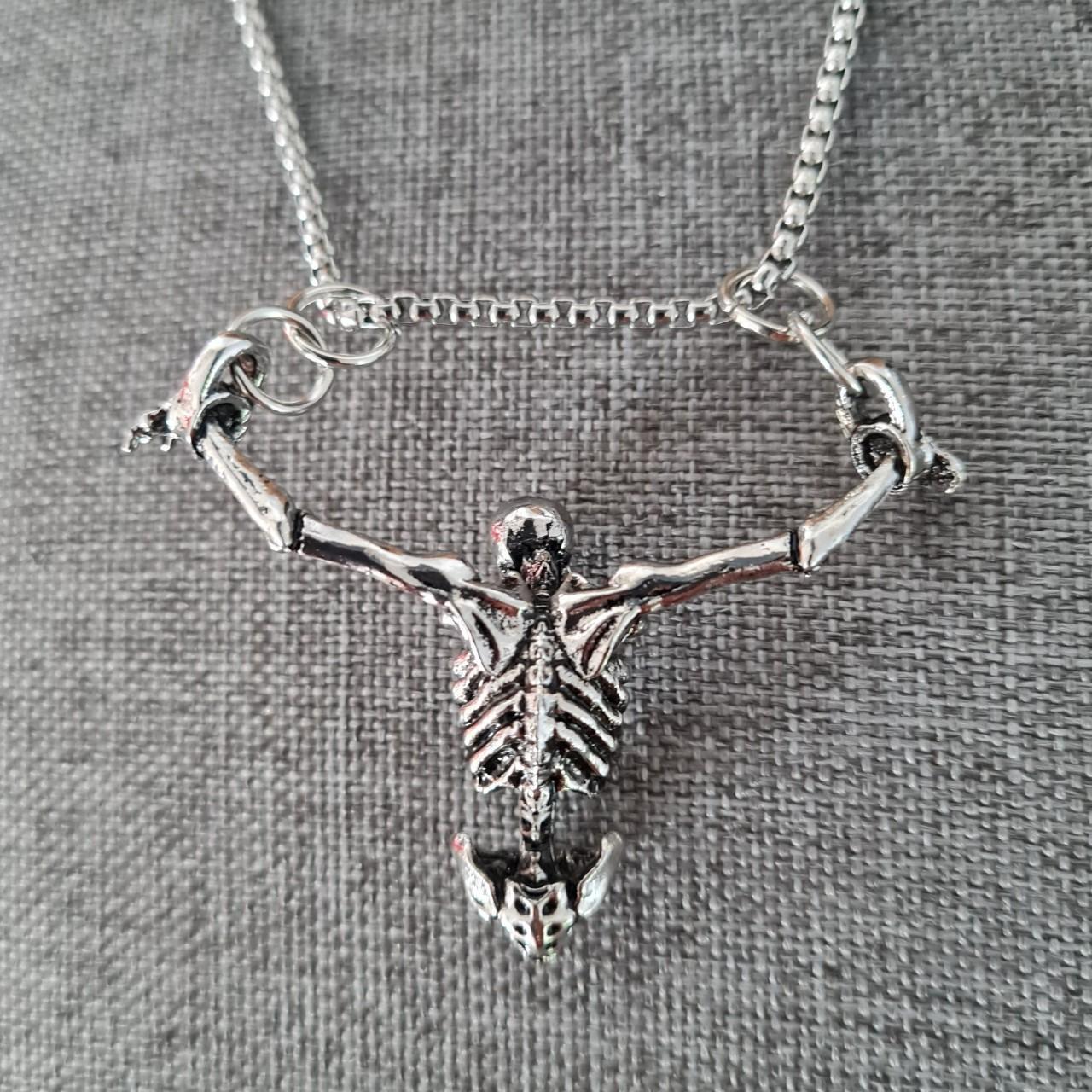 Chained skeleton necklace. Fantastic design both at... - Depop